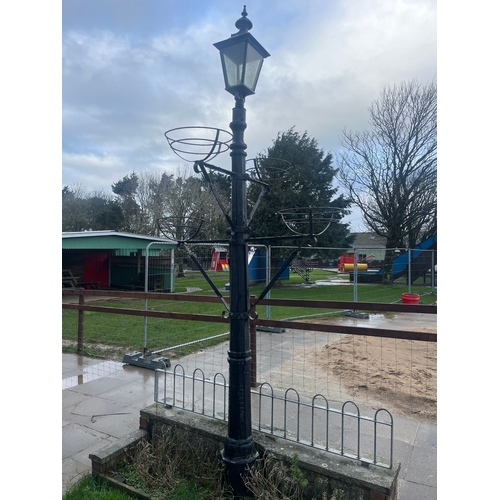 Pair of Cast Iron lamp post by Sara & Sons Redruth