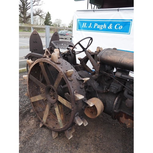 Fordson Standard N orange tractor. Fitted with steel front wheels ...