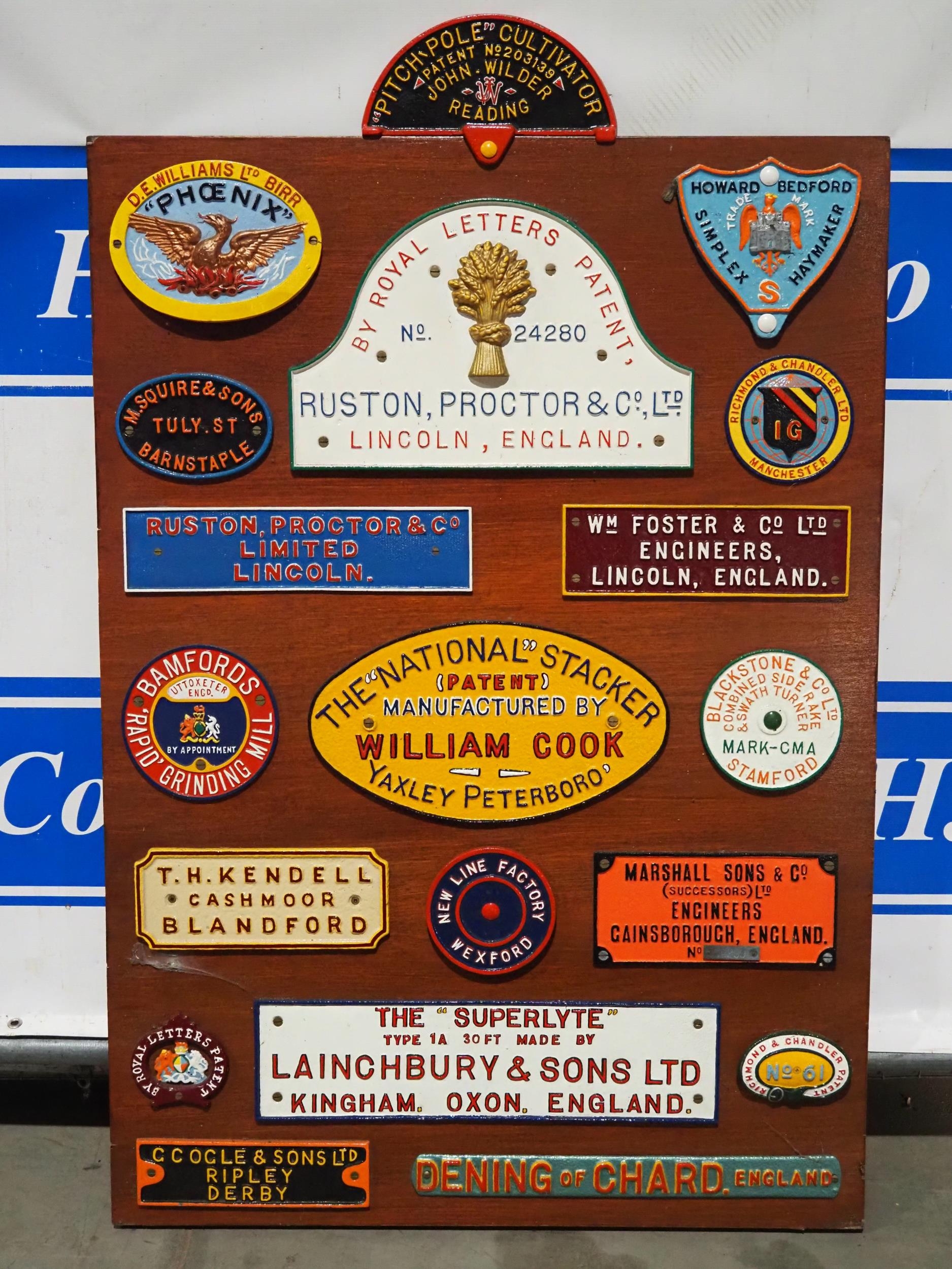 Display board of assorted cast iron name plates to include Phoenix ...