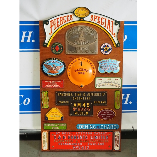 Display board of assorted cast iron name plates to include Bell ...