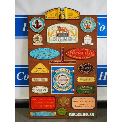 Display board of assorted cast iron name plates to include Hofherr ...