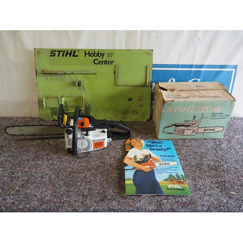 Stihl 010AV chainsaw, Stihl Hobby Center display rack, 011AV box and ...