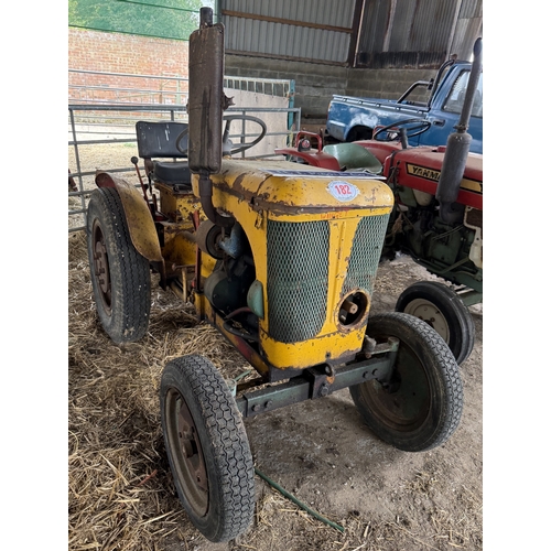 Winget compact tractor. Runs, c/w starting handle. Manual in office