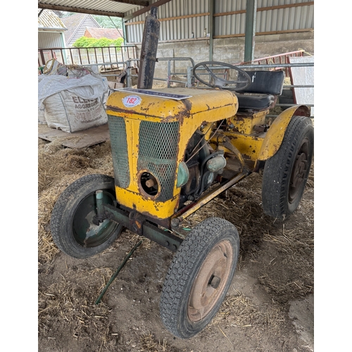 Winget compact tractor. Runs, c/w starting handle. Manual in office