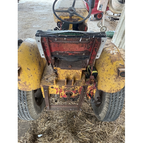 Winget compact tractor. Runs, c/w starting handle. Manual in office
