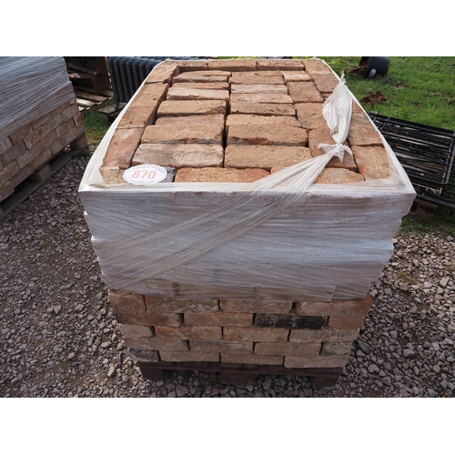 Pallet of reclaimed red bricks