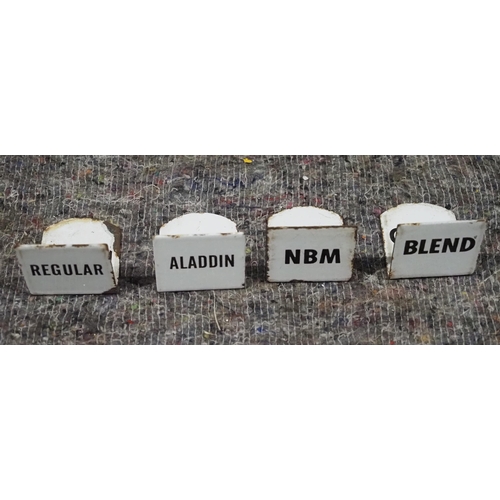 Enamel petrol pump labels to include Aladdin, Regular and NBM