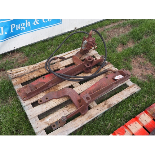Brackets and spool valve