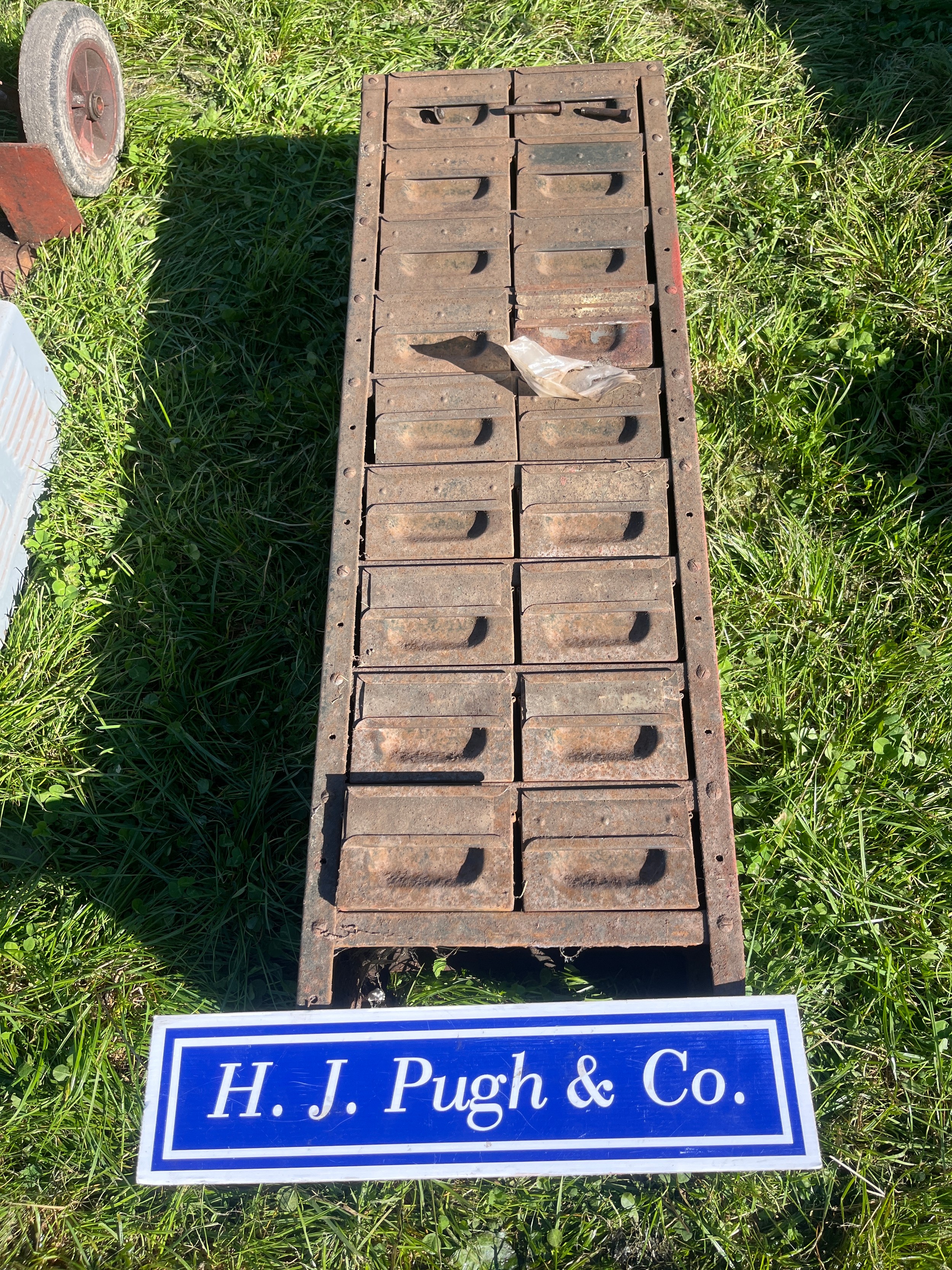 Metal pigeon hole racking and contents