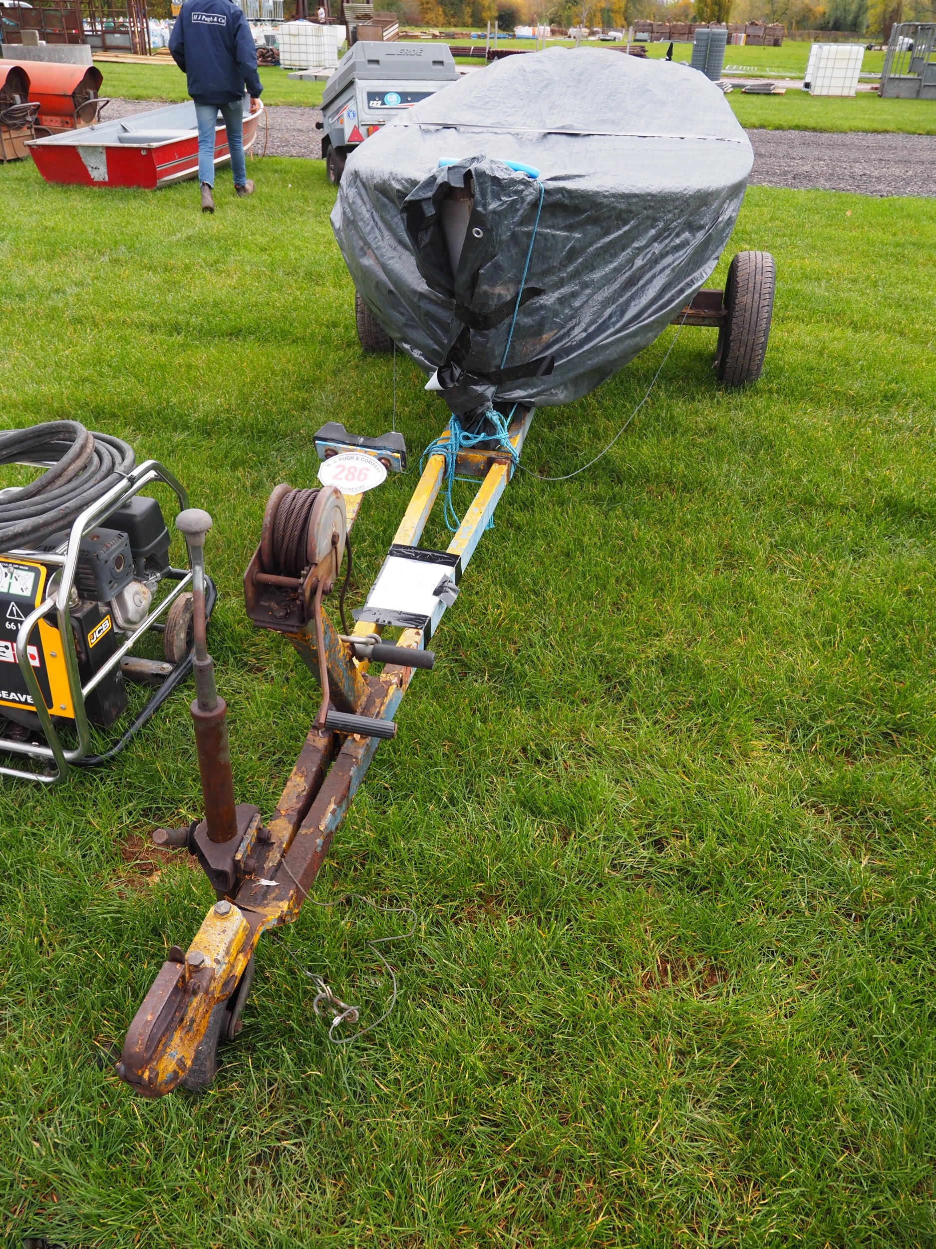 Embassy sailing dingy with Evinrude outboard motor, working, sails ...
