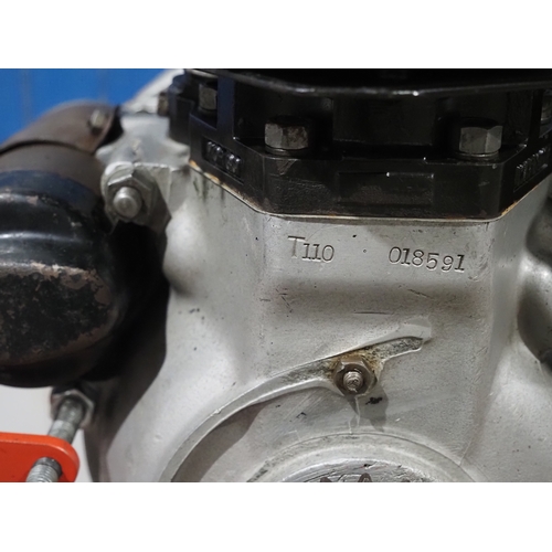 Triumph T110 engine on stand with carbs and magneto. No-T110 018591