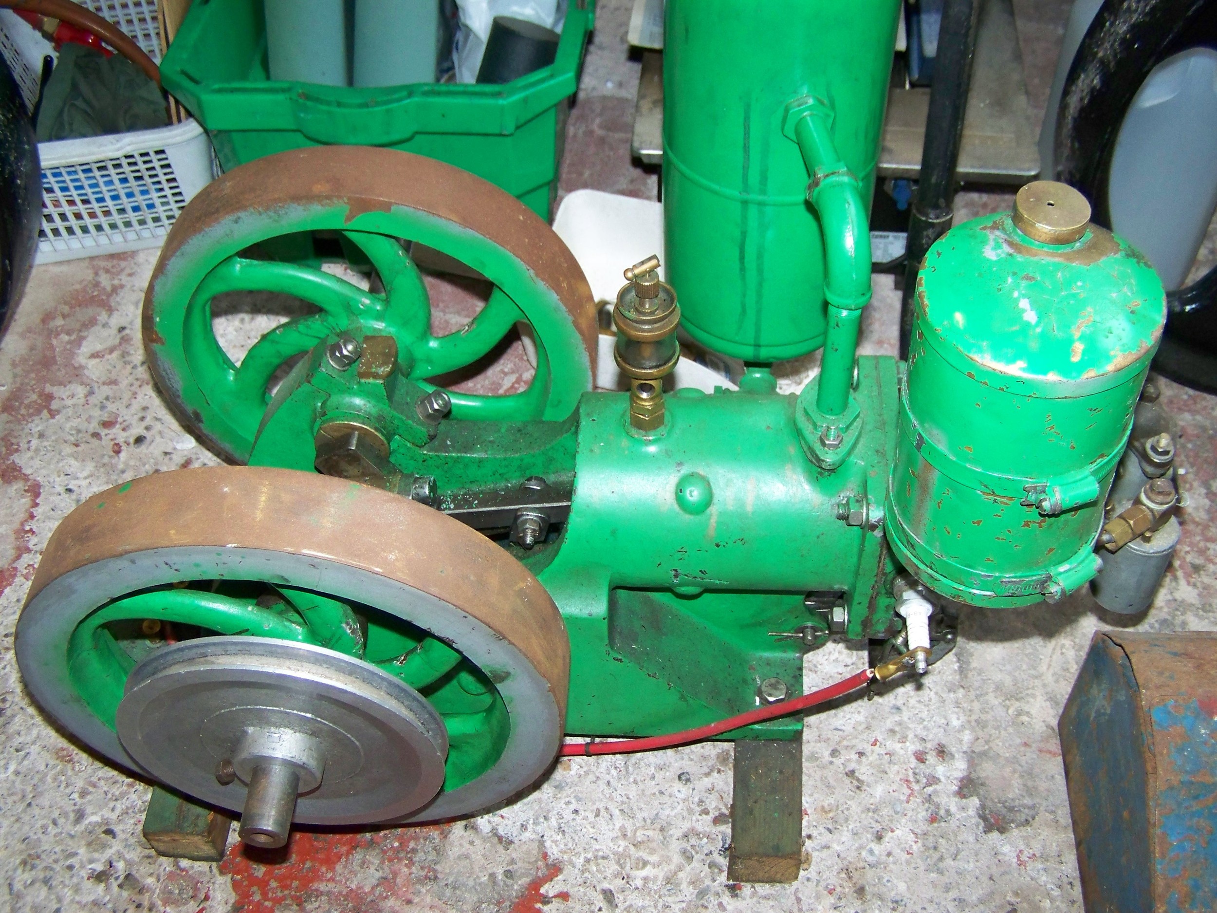 Small open crank gas/petrol engine, maker unknown. The exhaust valve is ...