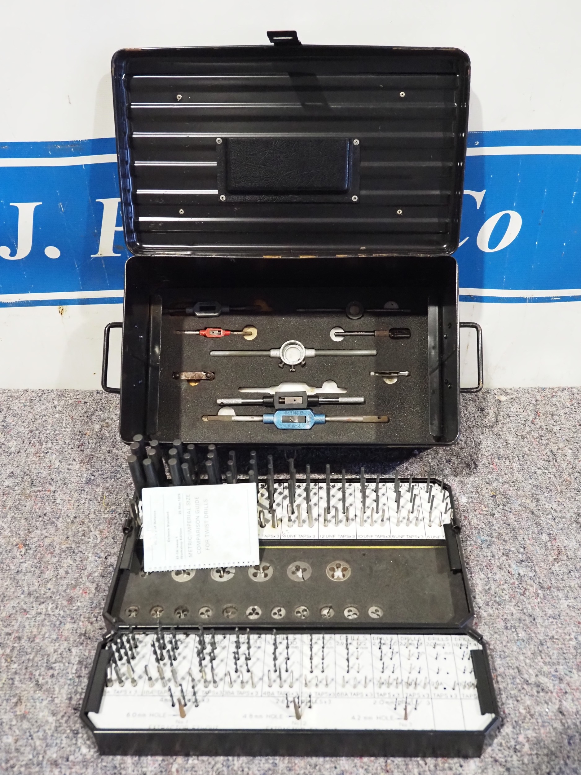 Metal toolbox and contents to include, drills, taps, dies, stud ...