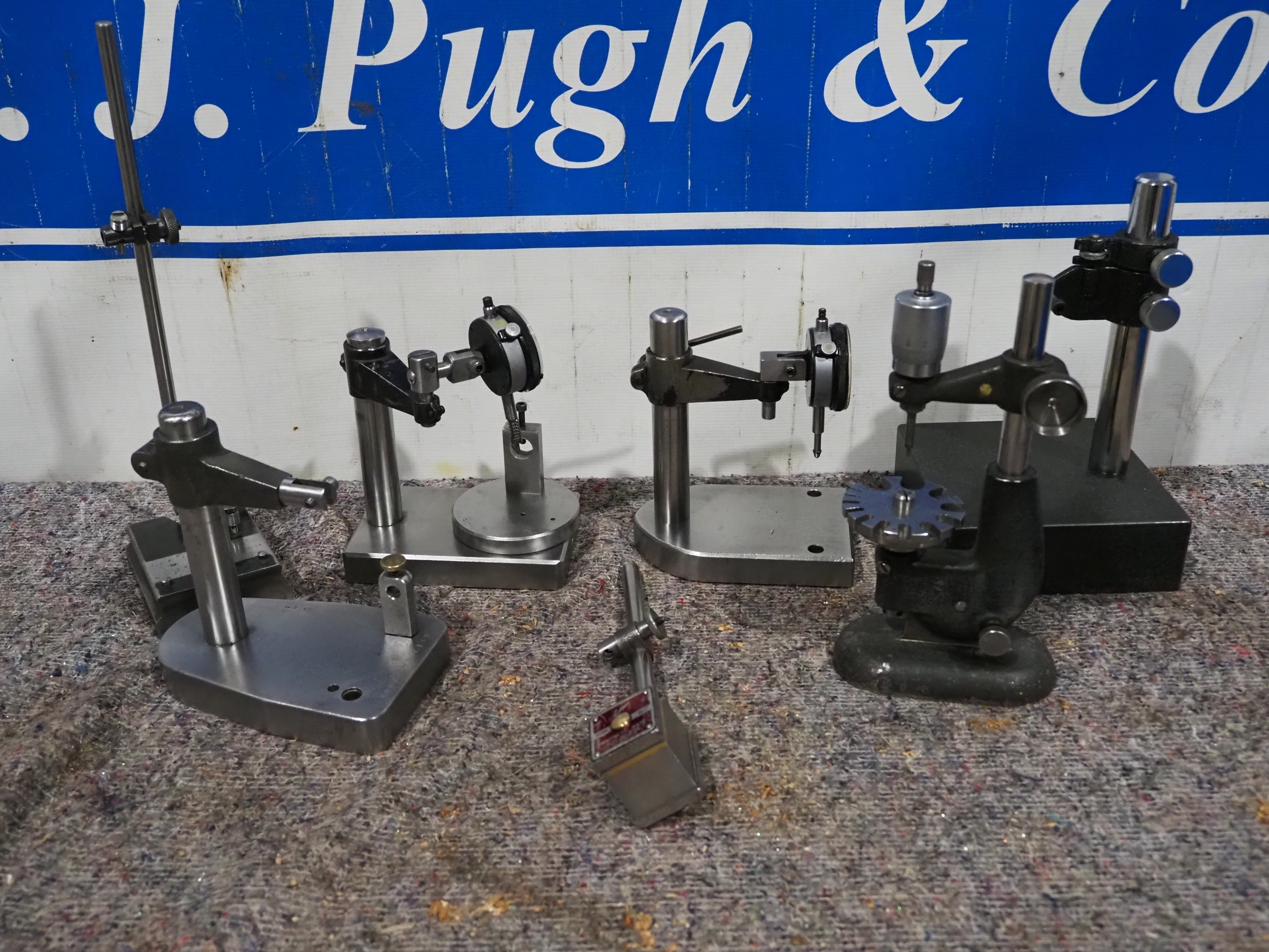 Dial indicators and dial indicator stands