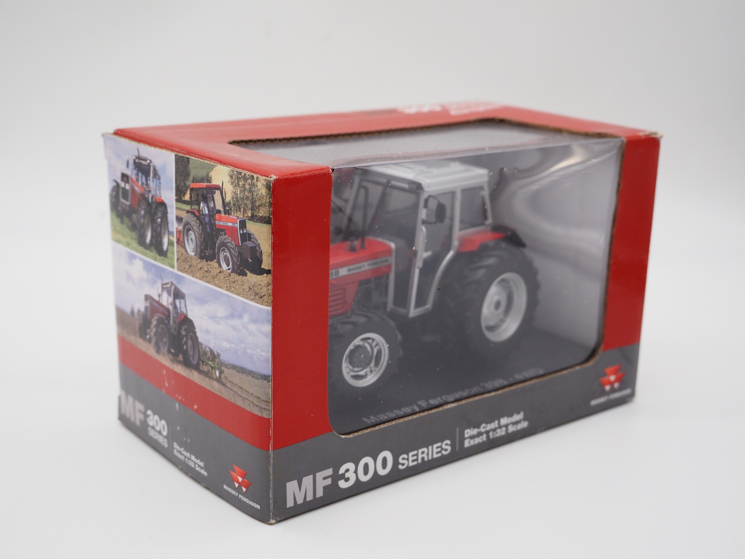 Universal Hobbies 1:32 scale boxed model Massey Ferguson 300 Series 398 4WD