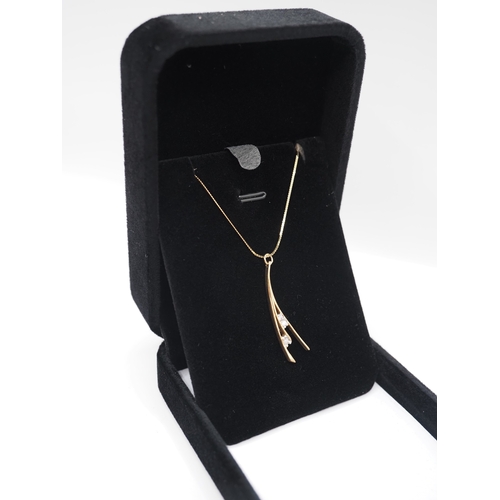 9ct Gold chain and pendant with diamond