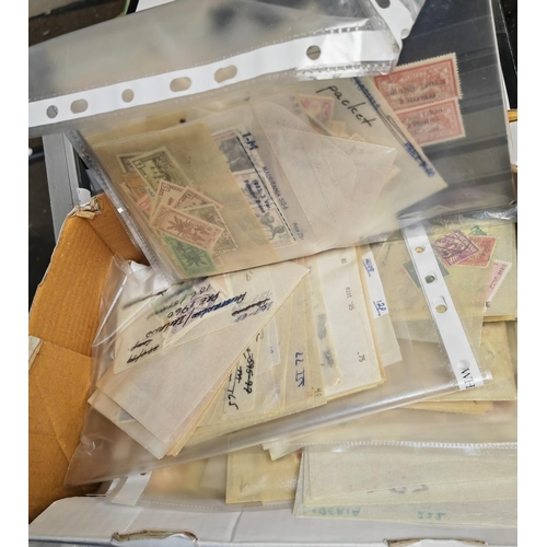 Box Of Worldwide Stamps In Packets