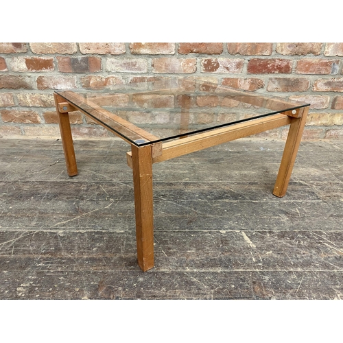 John Makepeace (b.1939) - glass top coffee table, 35 x 64cm