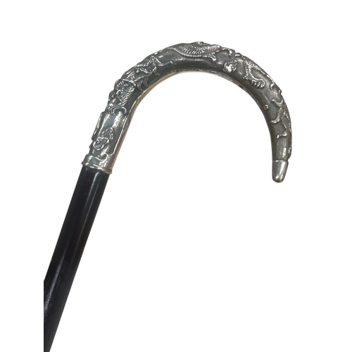 Antique Chinese walking stick with silver crook handle decorated with a ...