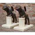 Pair of antique cast iron sphinx statues, raised on painted wooden ...