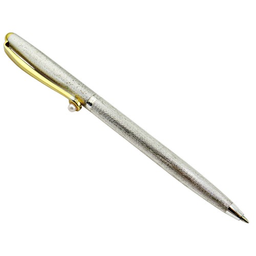 A rutilated quartz oval 'bulla' shaped pendant; a Mikimoto ballpoint ...