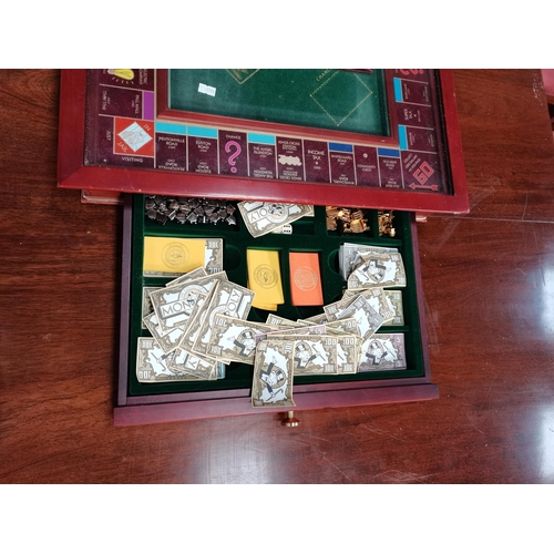 Monopoly game in Glass case with Franklin Mint booklet "The story ...