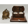 Antique wooden inkwell with pen rests plus miniature ornate clock