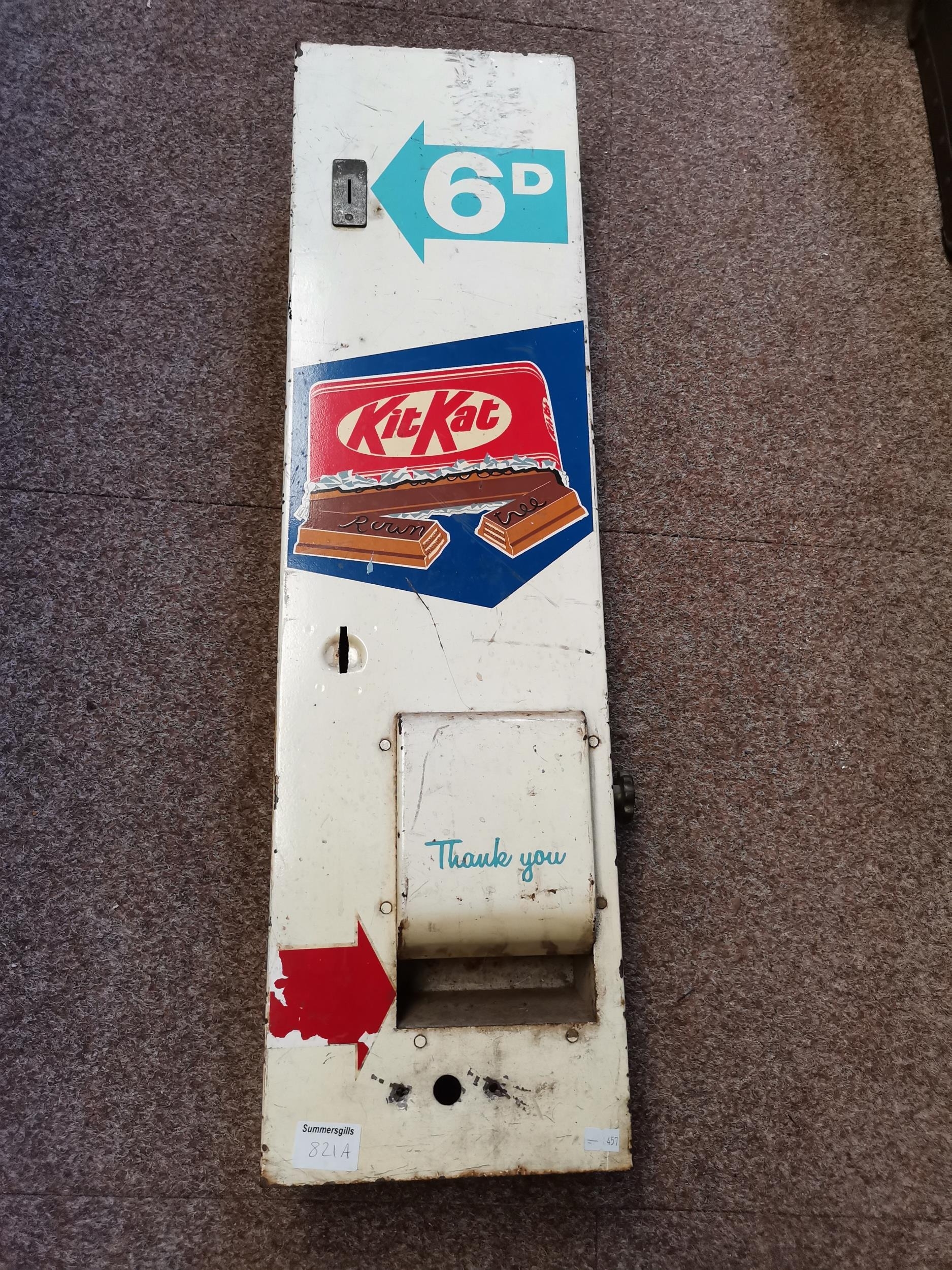 A vintage Kit Kat 6d vending machine, white with coloured decals. 81 ...