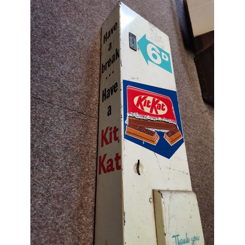 A vintage Kit Kat 6d vending machine, white with coloured decals. 81 ...