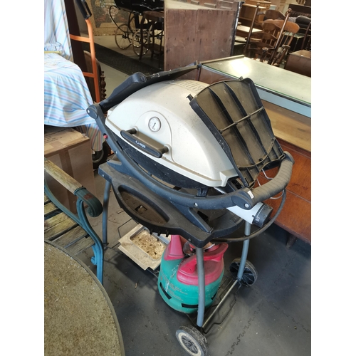 A WEBBER gas portable bbq