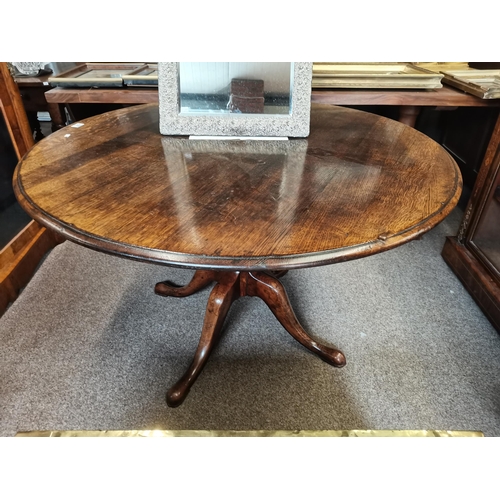 A Titchmarsh and Goodwin dining table in oak 120cm diameter with ...