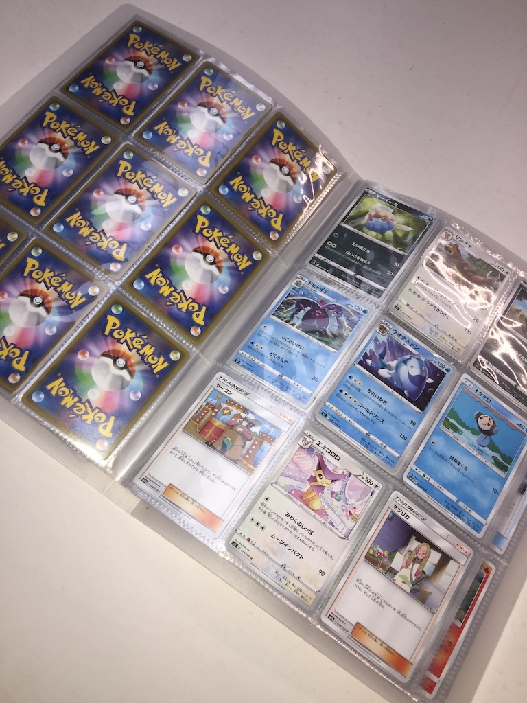 A collection of 112 Japanese Pokemon cards including 17 hologram