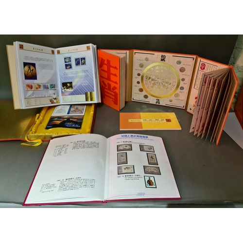 A group of Chinese Stamp albums and stamp presentation books to include ...