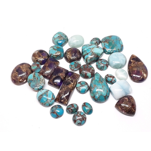 Assorted loose cabochon cut stones comprising copper mojave amethyst ...