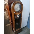 A 1920s oak cased grandmother clock with barometer, complete with ...