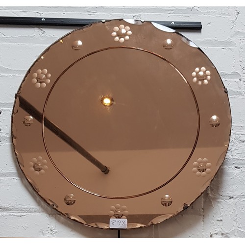 1930s Art Deco peach glass wall mirror, 50cm diameter.