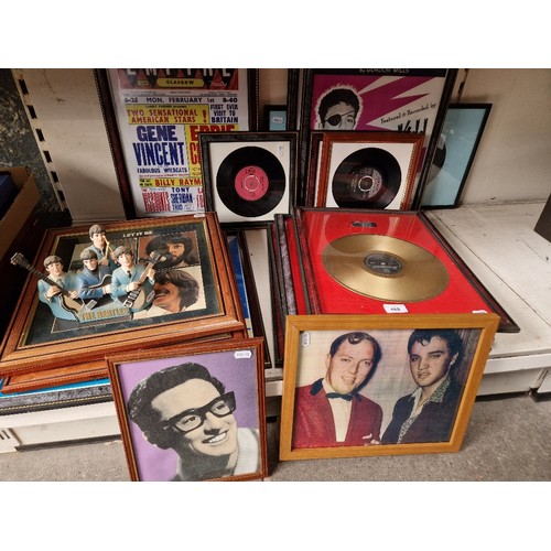 A collection of framed Rock & Roll music memorabilia including The ...