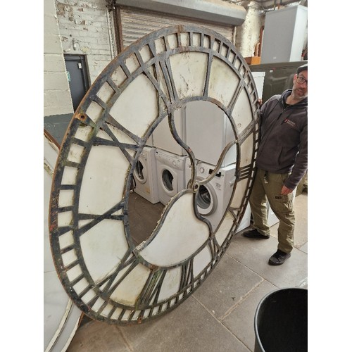 Four 6' 4" chapter rings/clock dials with four pairs of hands and a ...
