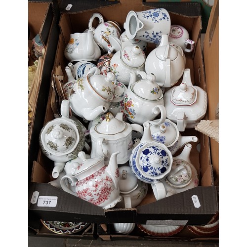 Box of small china teapots