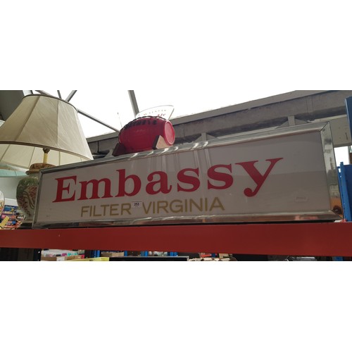 An Embassy filter virginia advertising light with a Watneys advertising ...