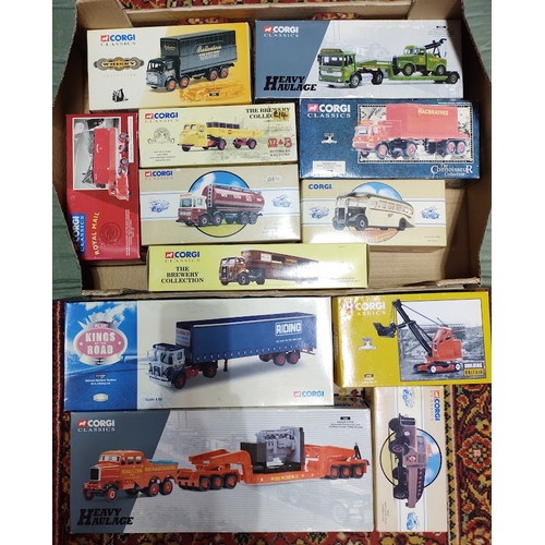 A box of assorted Corgi diecast vehicles in original boxes