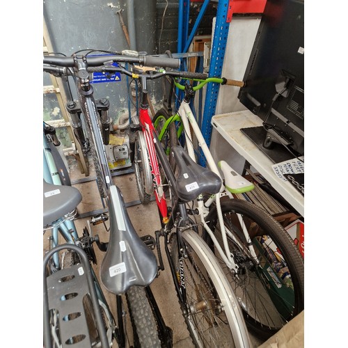 A Giant mountain bike with 18 speed Shimano gears and 26" wheels