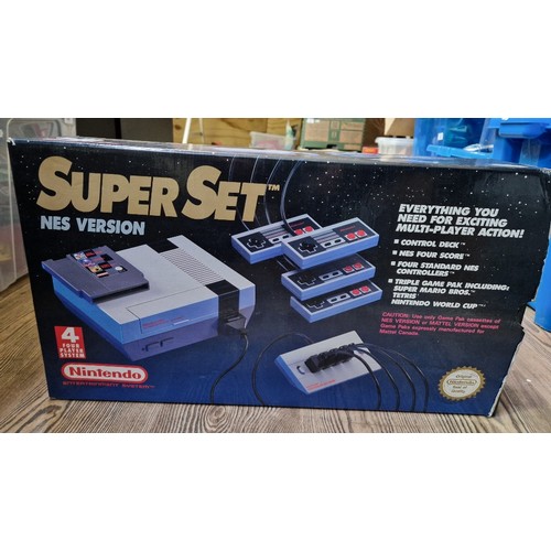 A Nintendo Super Set NES version, in original box with controllers & games.