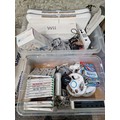 Two boxes of assorted Nintendo Wii items to include 3 consoles, games ...