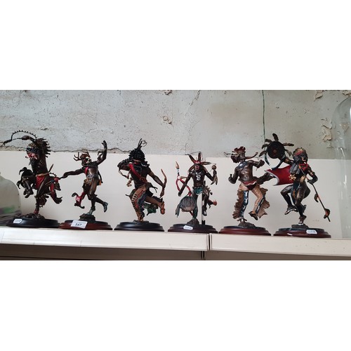 A group of six assorted Franklin Mint bronze Native American figures.