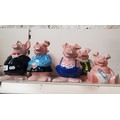 A group of eight Natwest Wade pigs