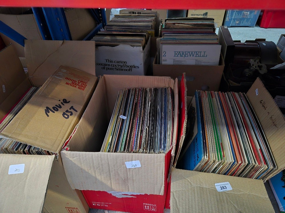 Three boxes of vinyl LP records including movie soundtracks, musicals ...