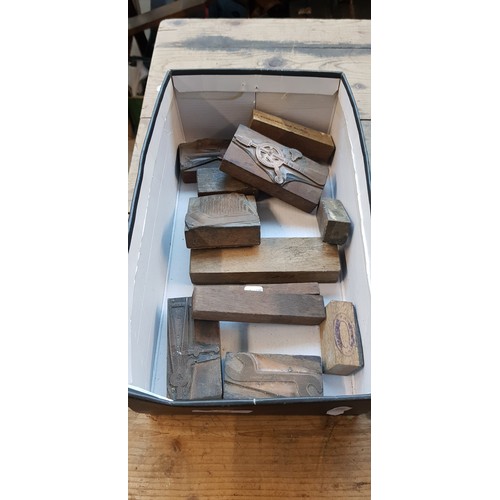 A small box of engraving blocks of engineering tools