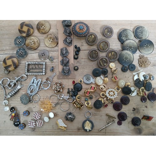 A box of assorted mainly vintage buttons, badges including Robertsons ...