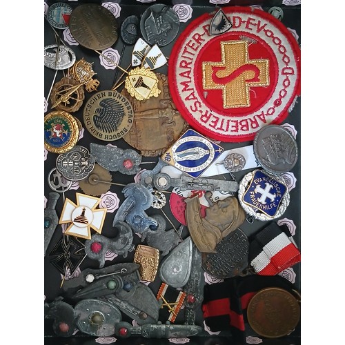 A box of assorted German badges and medals, including military, WWII ...